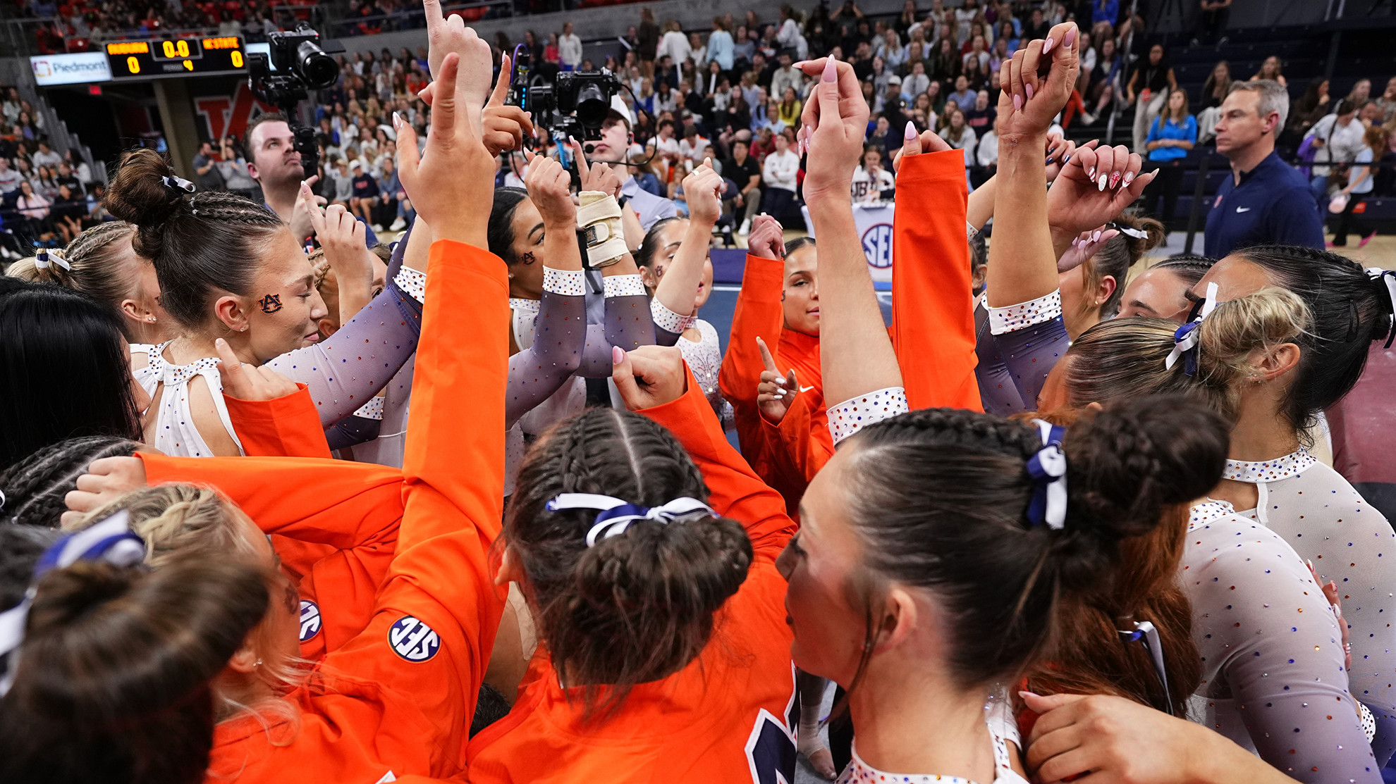 History made: No. 11 Auburn defeats No. 23 NC State 197.150-196.075 in ...